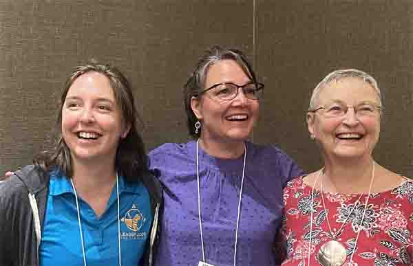 picture shows a closeup of Sarah, Jen and Beezy smiling broadly.